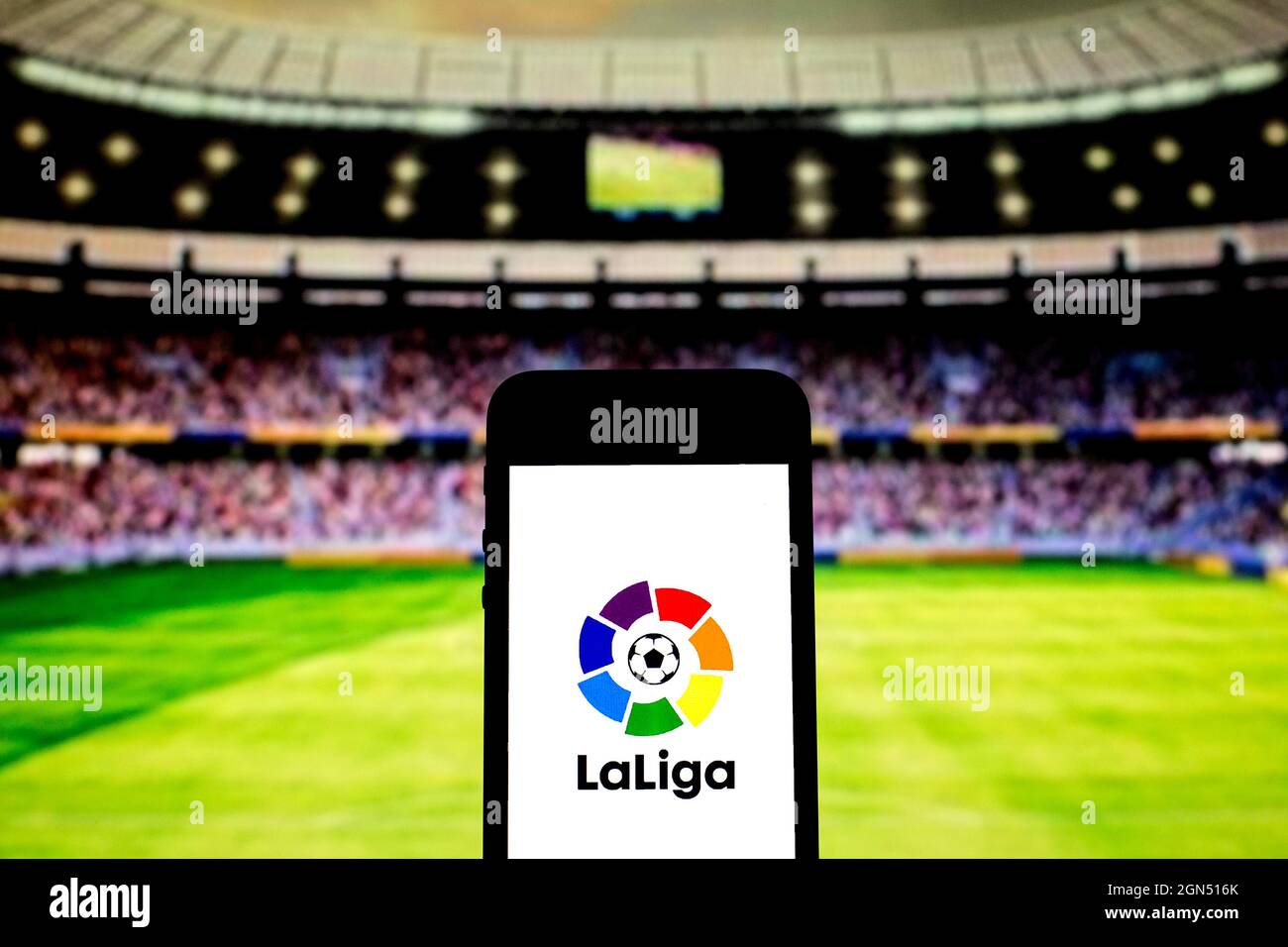 In this photo illustration a LaLiga logo seen displayed on a smartphone ...