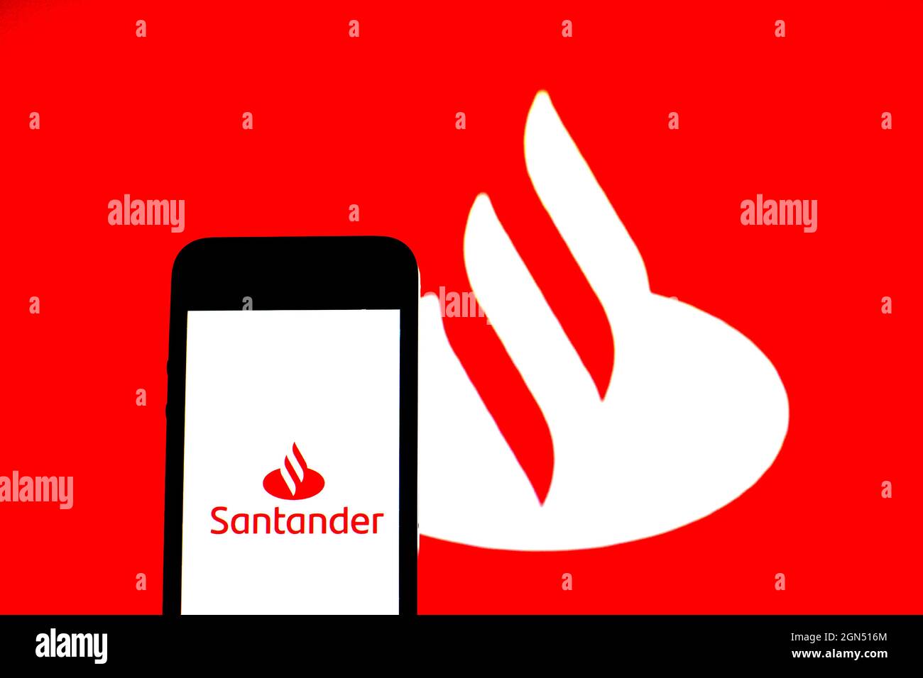 In this photo illustration a Banco Santander, S.A. logo seen displayed ...
