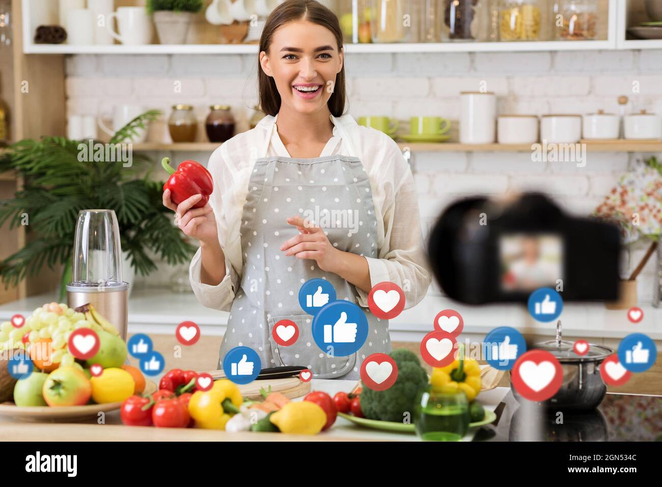 Happy young european lady food blogger or chef, prepare healthy ...