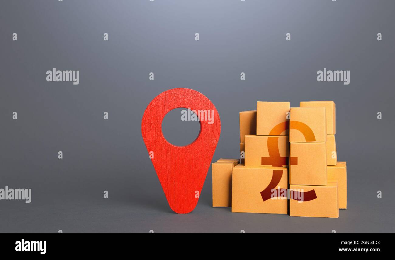 Cardboard boxes with british pound sterling and red pin location ...