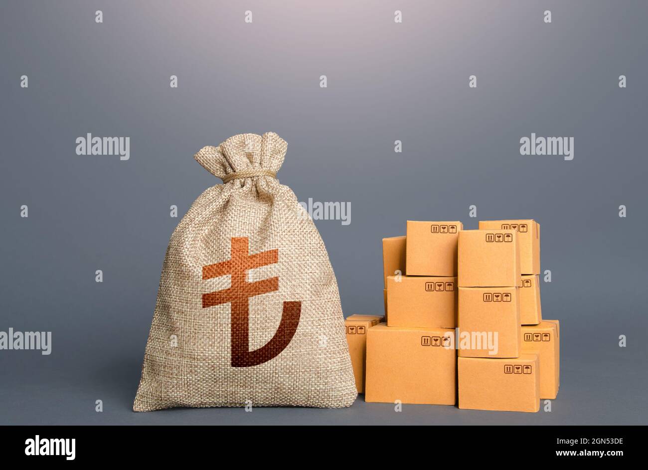 Boxes and turkish lira money bag. The concept of trade in goods and ...