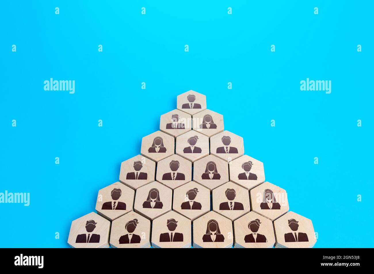 People grouped in an arrow formation. Attracting supporters, building a ...