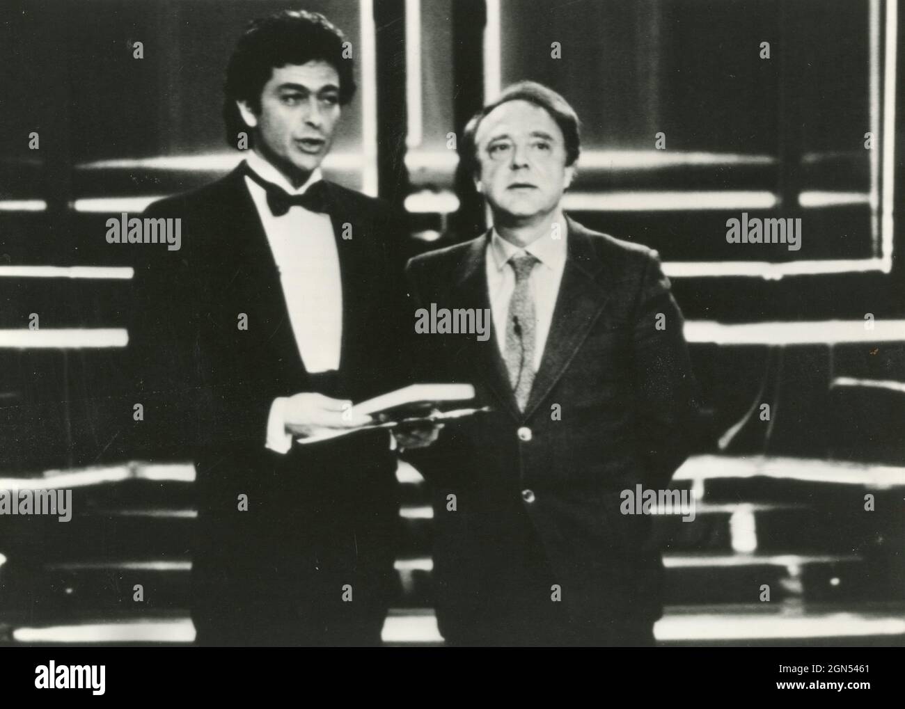 Italian writer and moviemaker Alberto Bevilacqua (right) and TV host ...