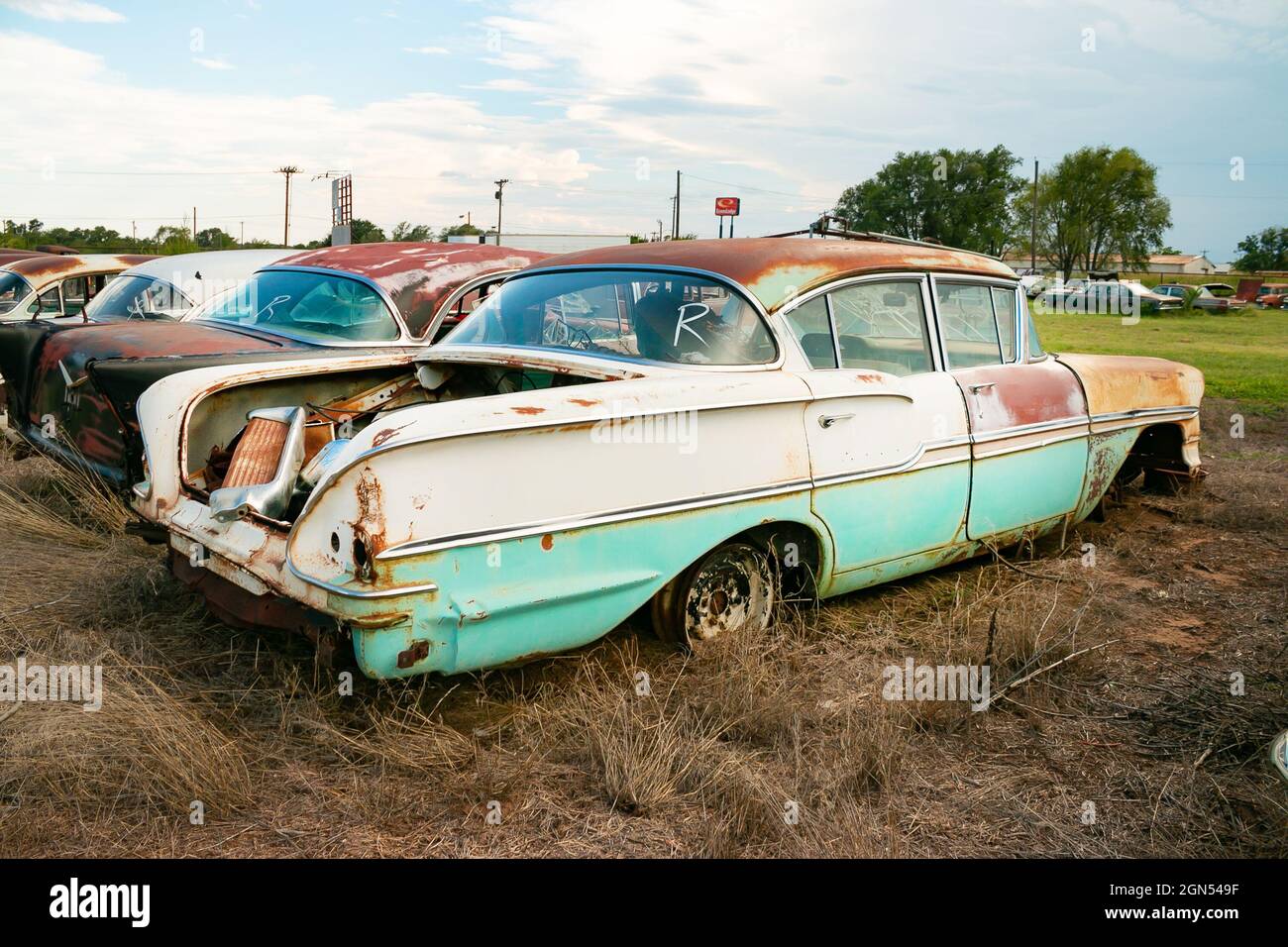 vintage wrecked American cars in junkyard near Amarillo on Route 66 USA ...