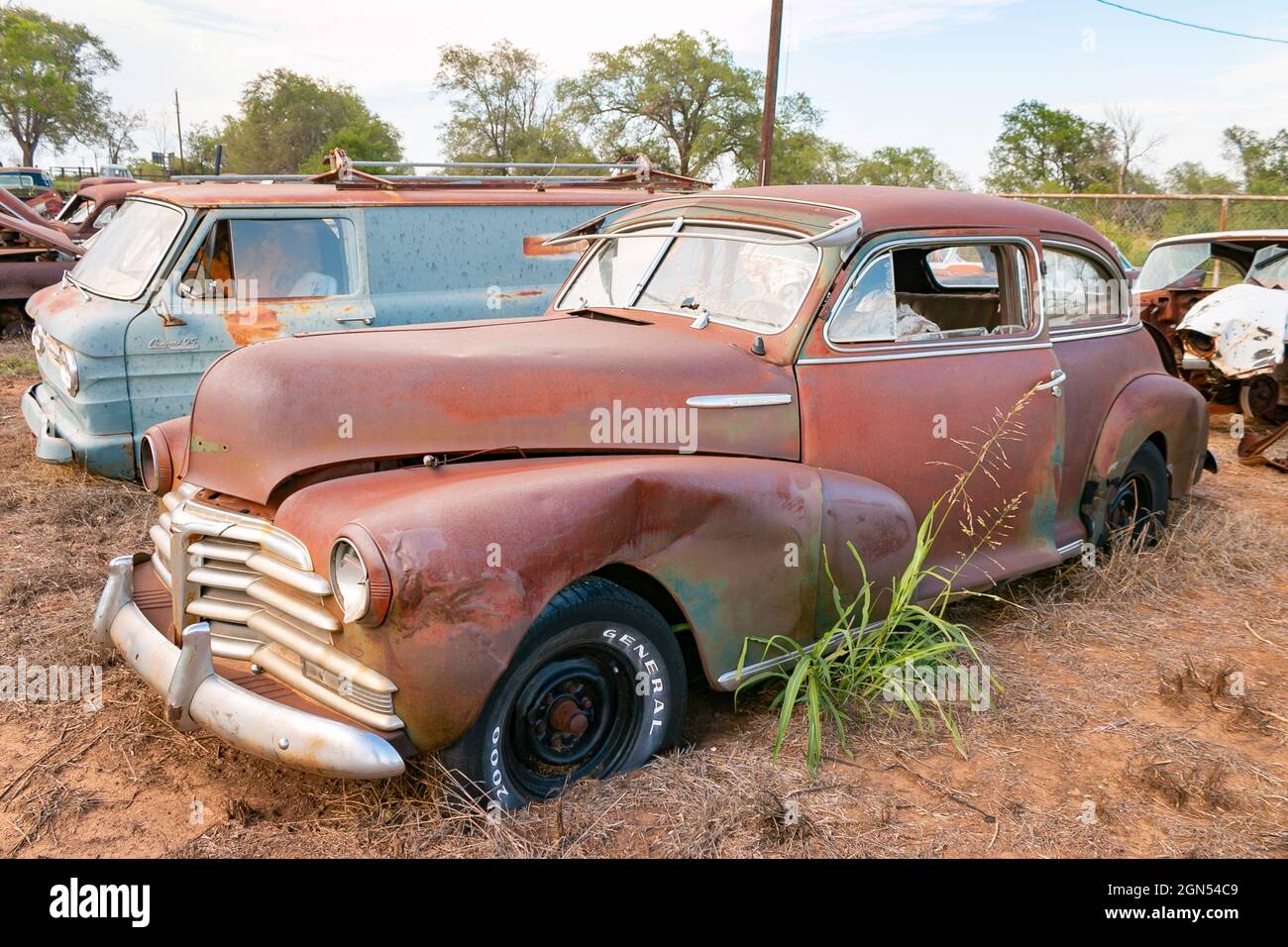 vintage wrecked American cars in junkyard near Amarillo on Route 66 USA ...