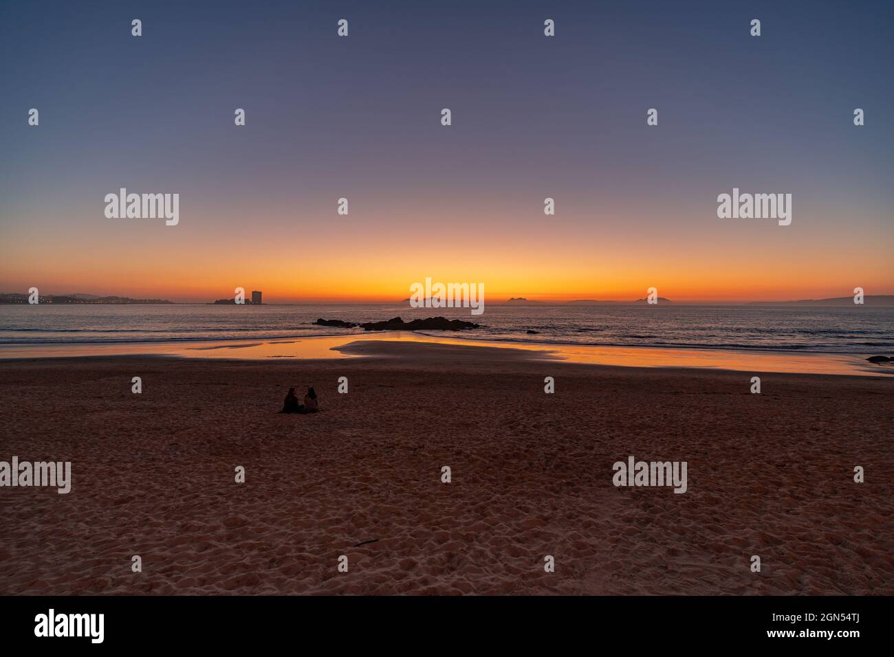Beautiful sunset on the beach Stock Photo - Alamy