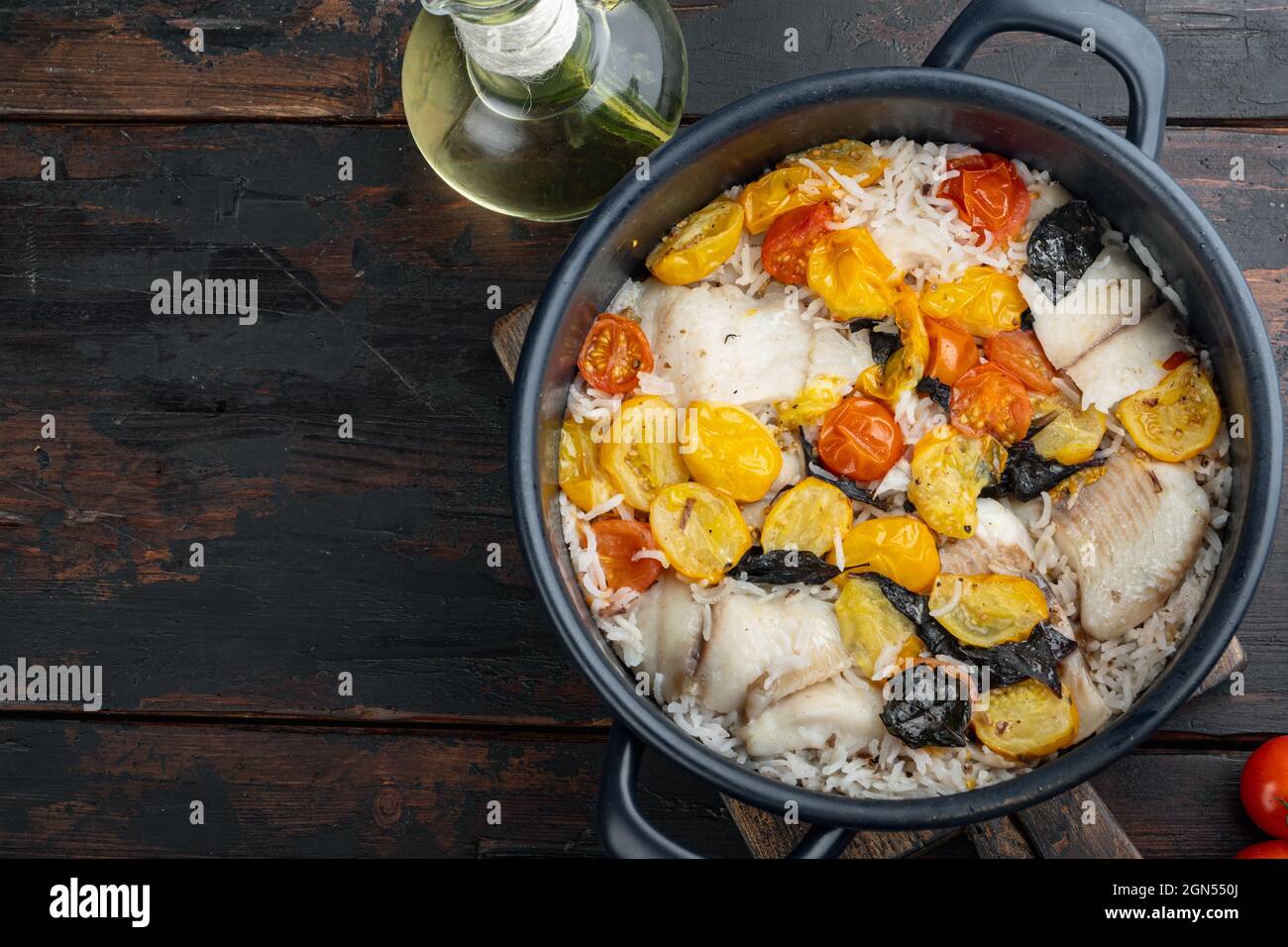 One pan fabulous fish, with basmati rice and cherry tomatoes, on old ...