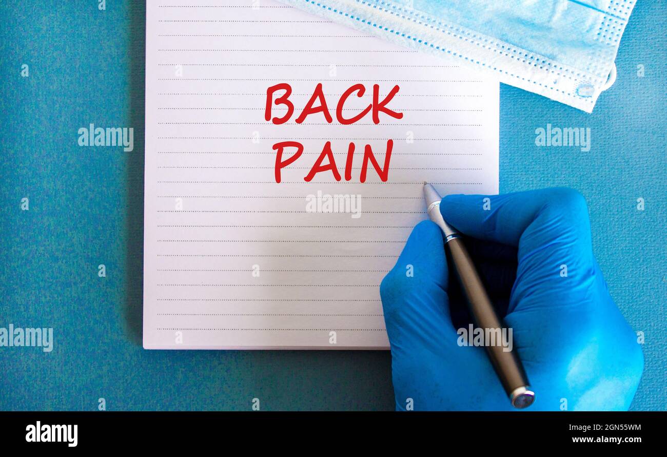 Back pain symbol. White note with words Back pain, beautiful blue ...
