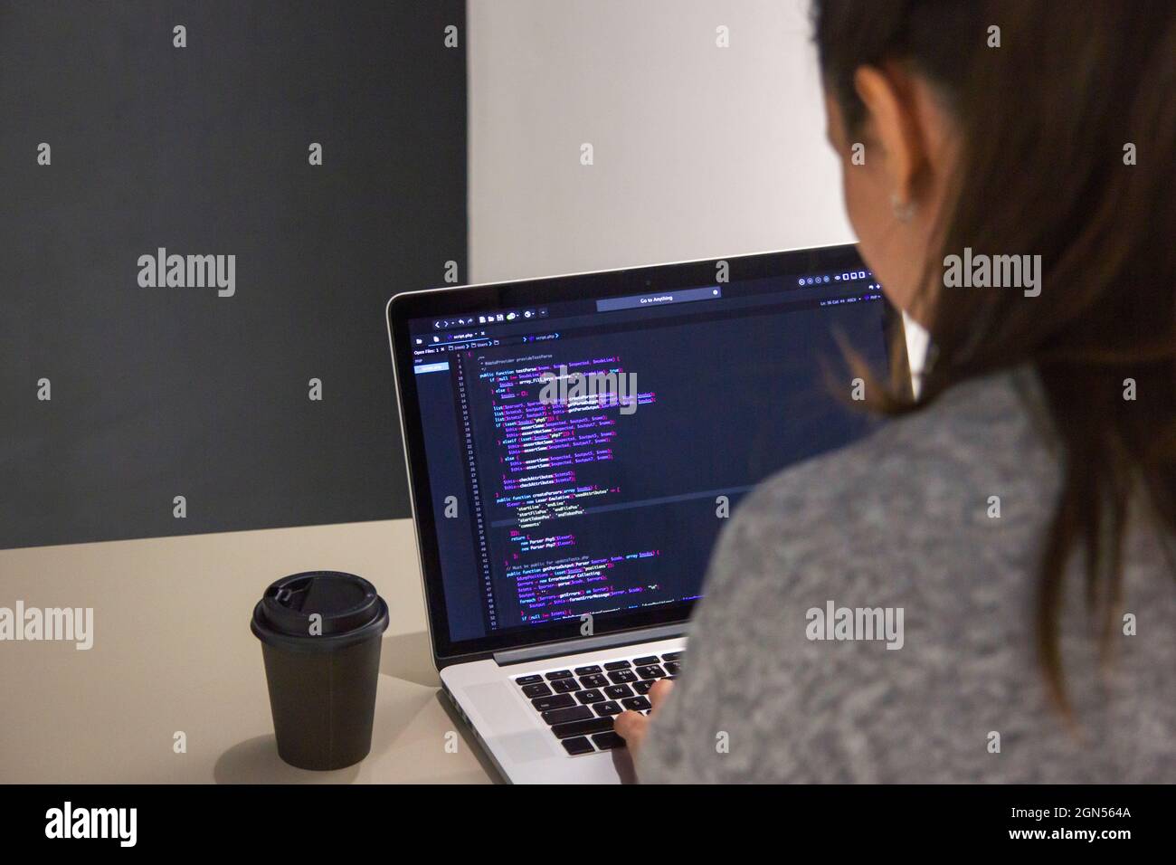 Woman programmer typing code application hi-res stock photography and ...