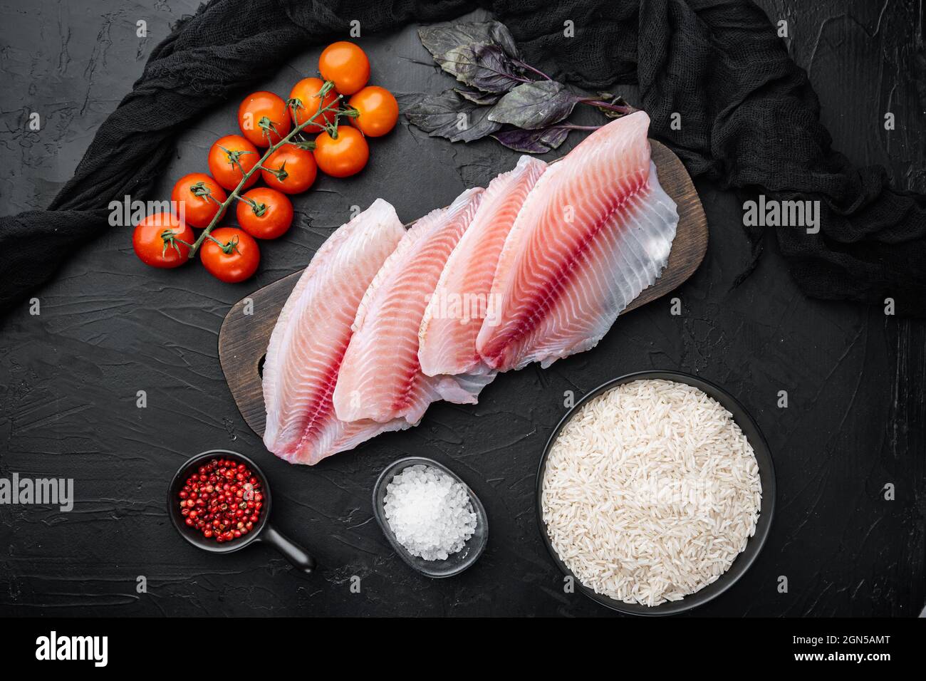 White fish fillet, with basmati rice and cherry tomatoes ingredients ...