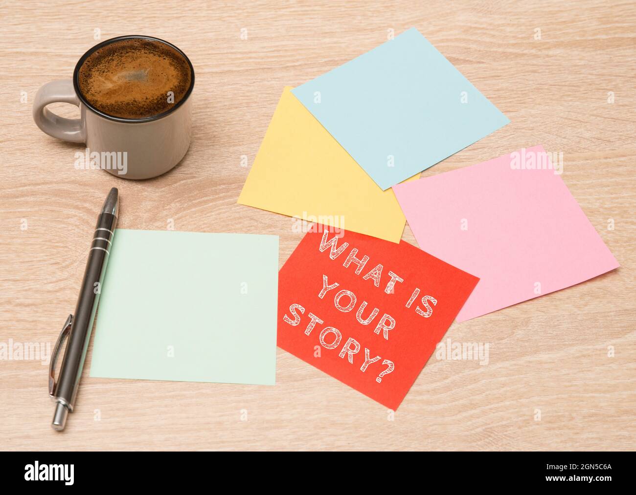 Story telling, cup coffee beside colorful paper, handwritten what is ...