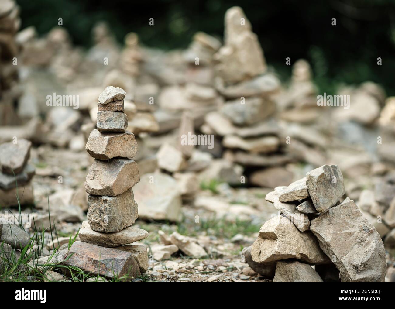 Garden of stones. Pyramids from rocks of brick breeds. Balance concept ...