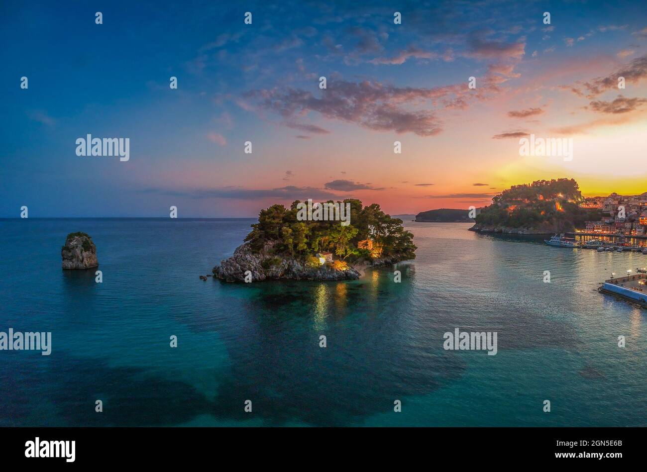 Aerial panoramic cityscape view over Parga coastal city, Epirus, Greece ...