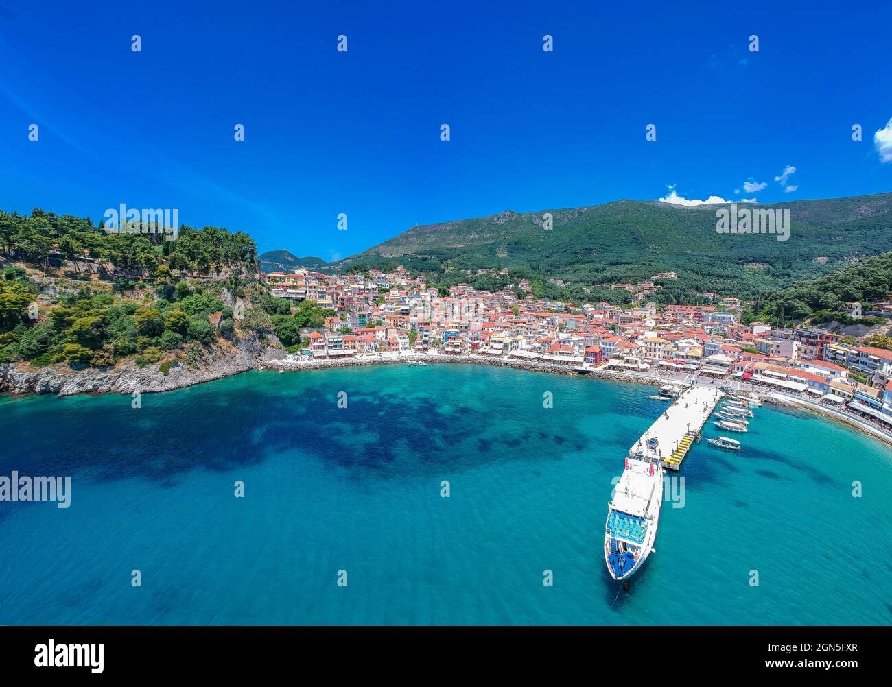 Aerial panoramic cityscape view over Parga coastal city, Epirus, Greece ...