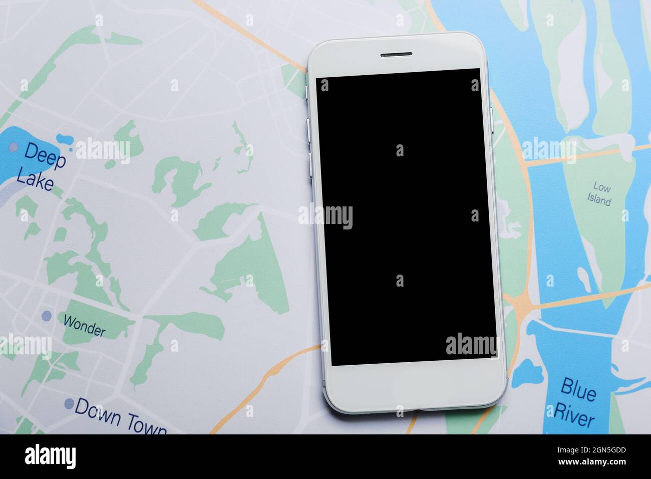 Modern mobile phone on city map Stock Photo - Alamy