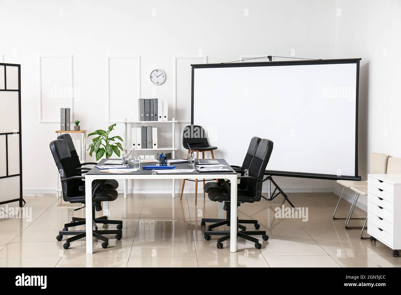 Modern office with projector prepared for conference Stock Photo - Alamy