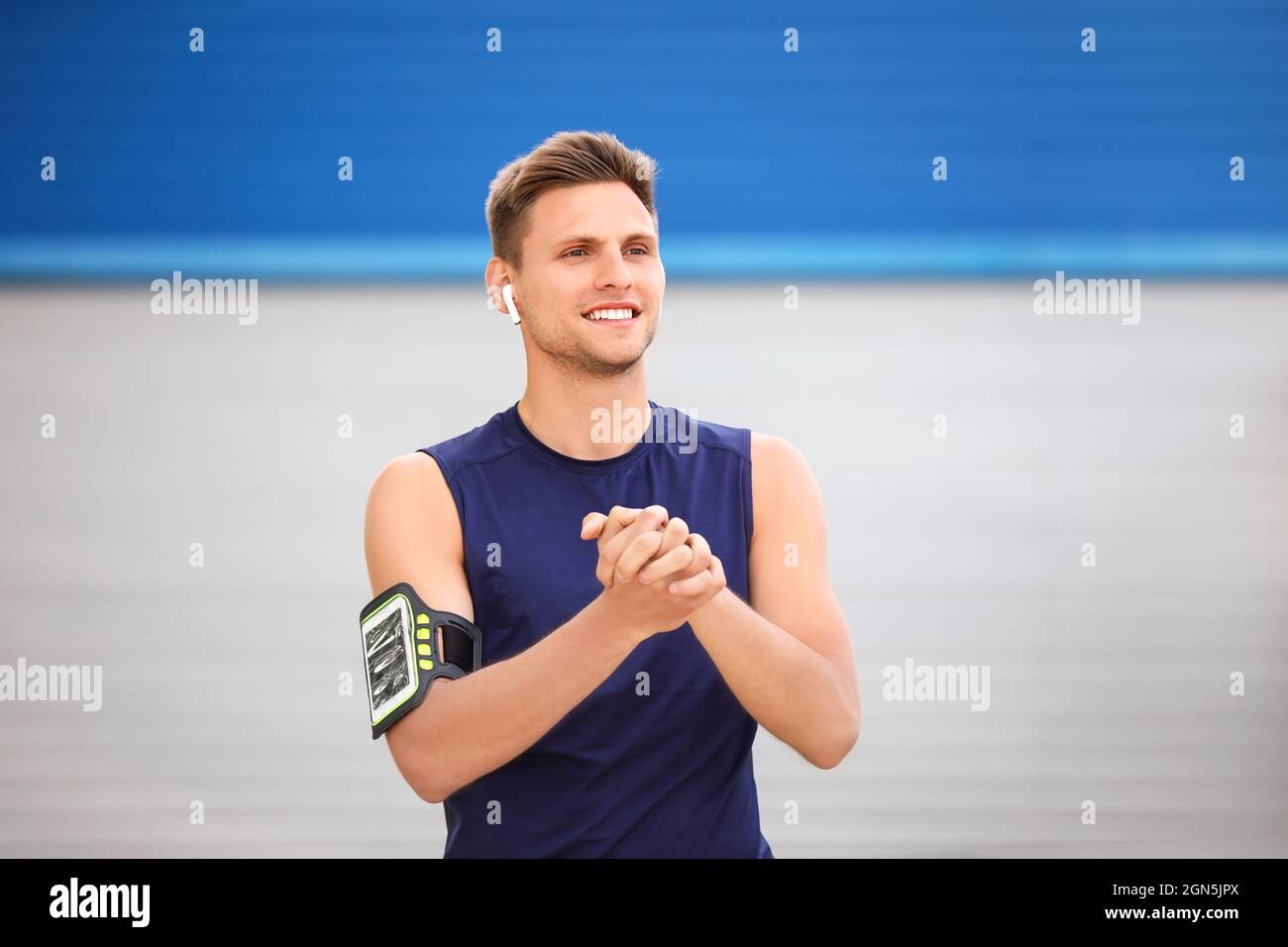 Sporty young man exercising hi-res stock photography and images - Alamy
