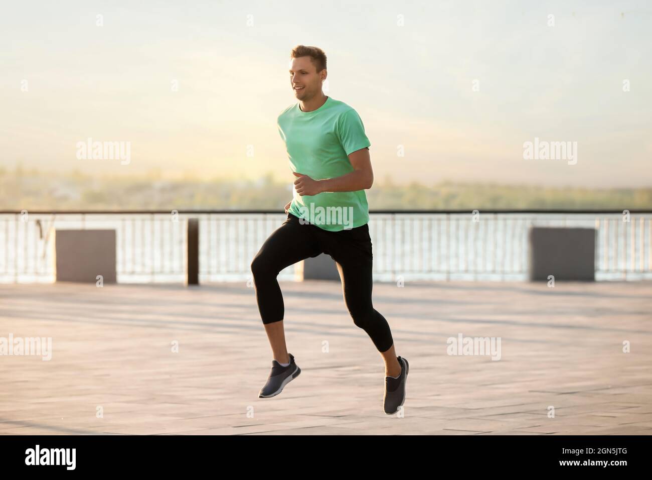 Strong man caucasian running near hi-res stock photography and images ...