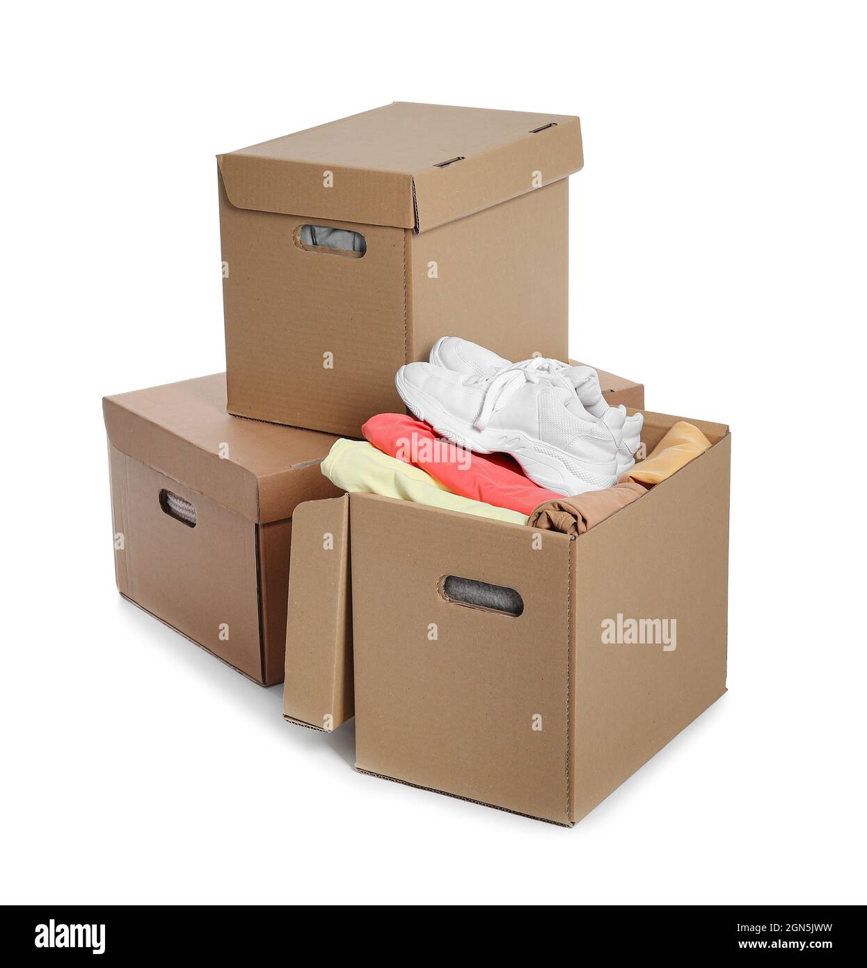 Wardrobe boxes with different clothes on white background Stock Photo ...
