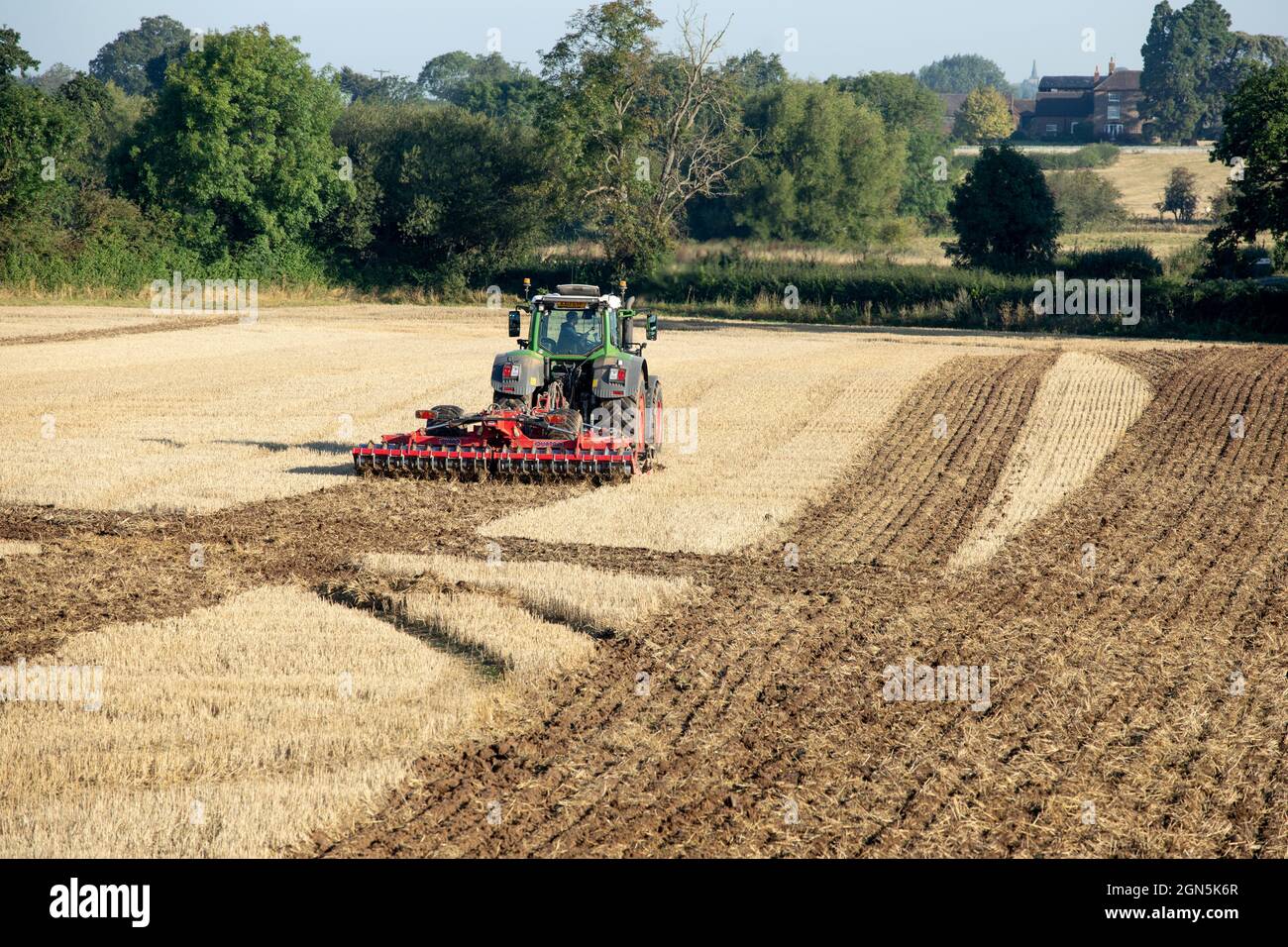 A farmer ploughing fields near Atherstone, Warwickshire on the first ...