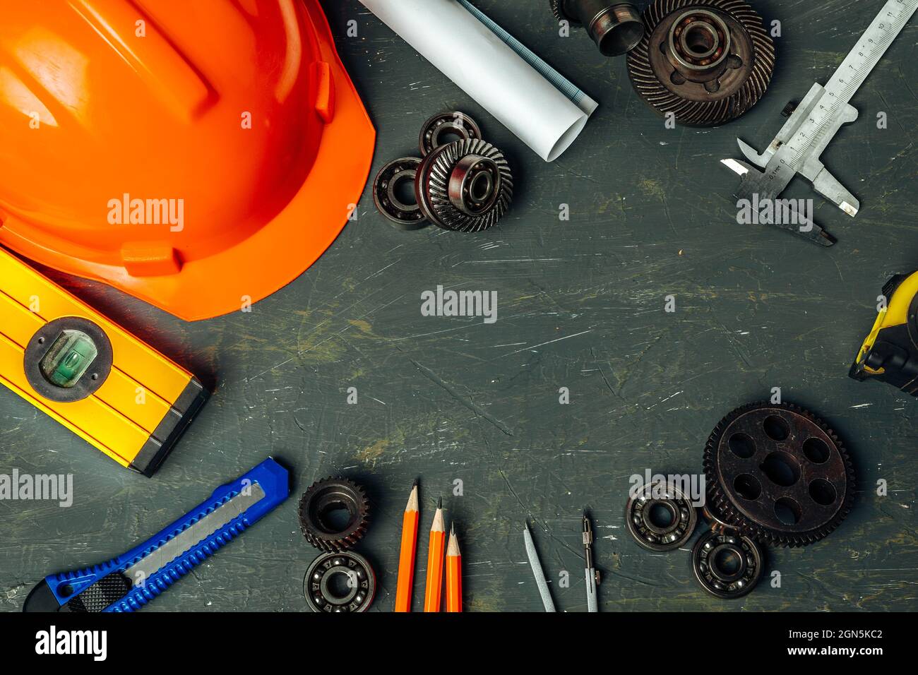 Machine engineer tools set on dark wooden background Stock Photo - Alamy