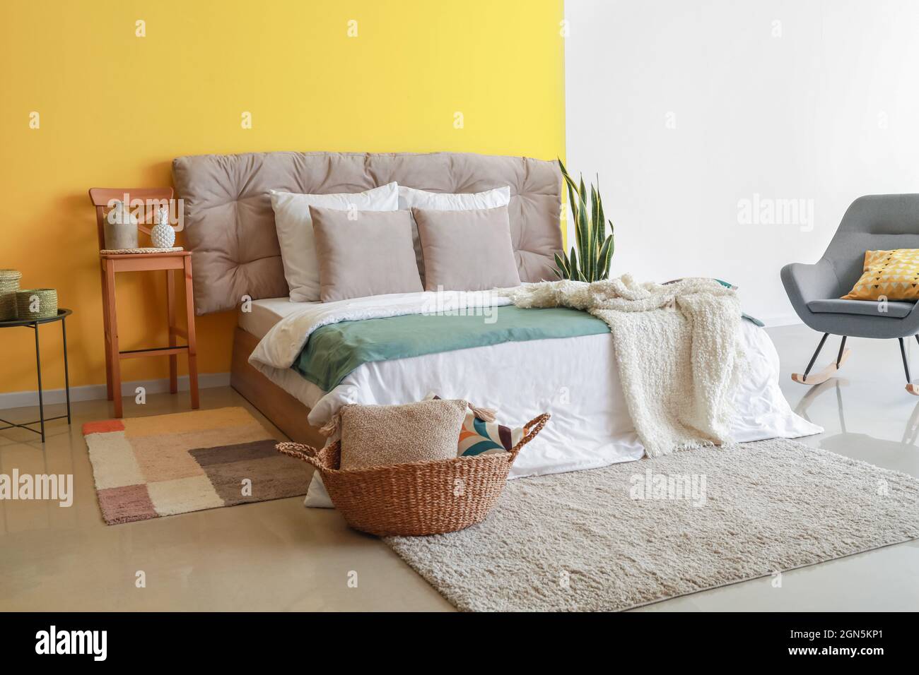 Modern bedroom with comfortable furniture and stylish decor Stock Photo ...