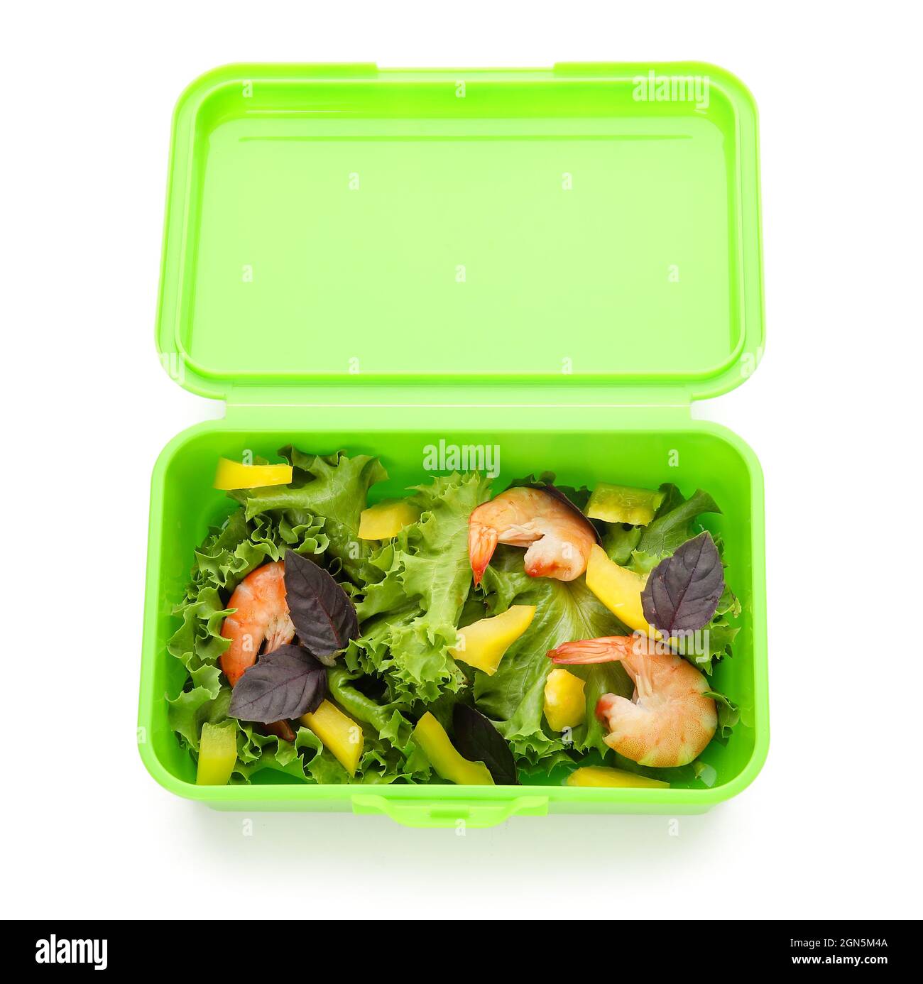 Green container with tasty salad on white background Stock Photo - Alamy
