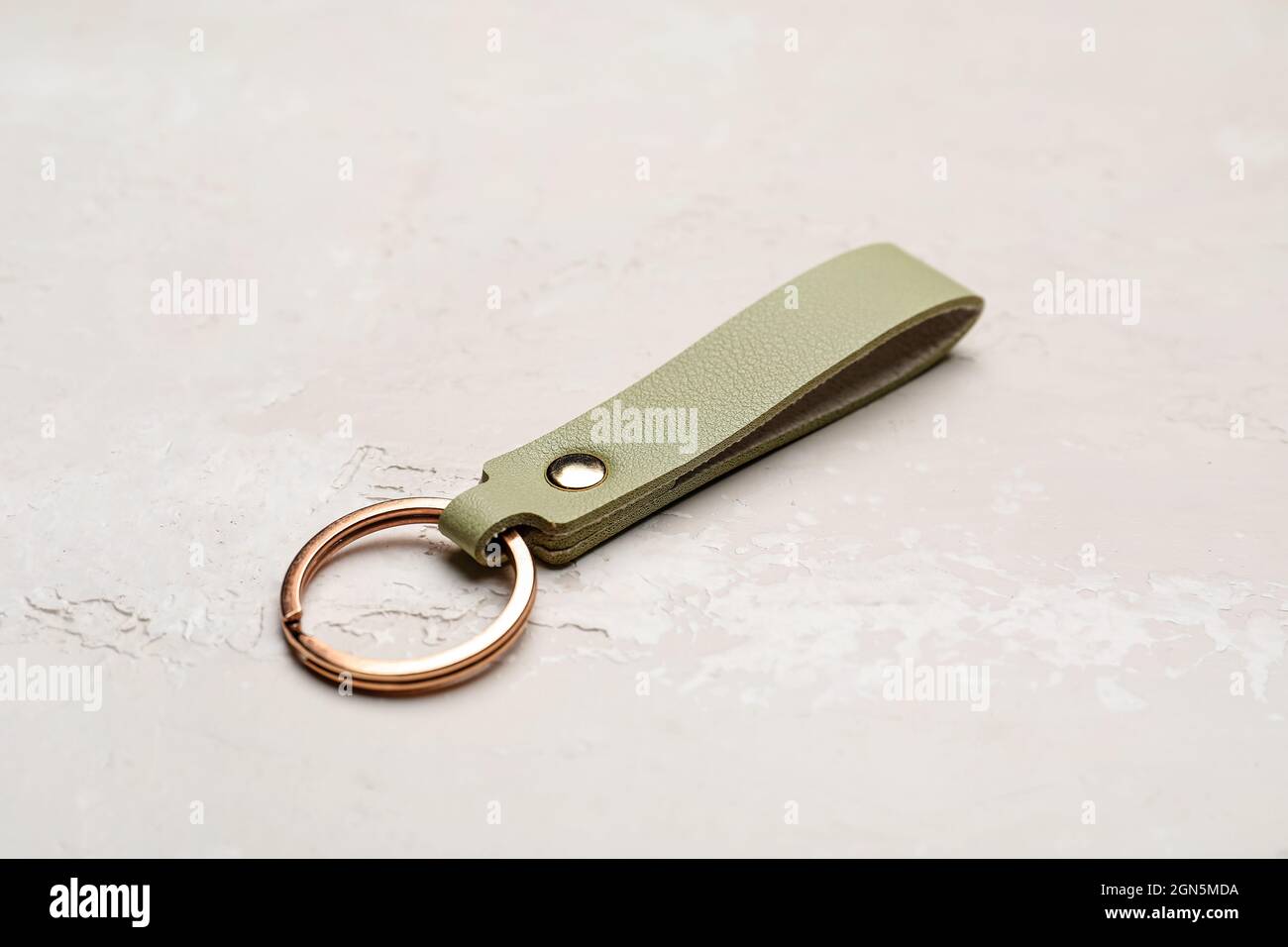 Green leather key holder hi-res stock photography and images - Alamy