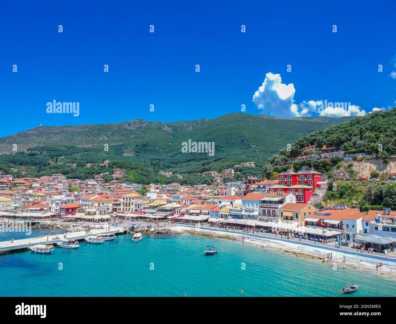 Aerial panoramic cityscape view over Parga coastal city, Epirus, Greece ...