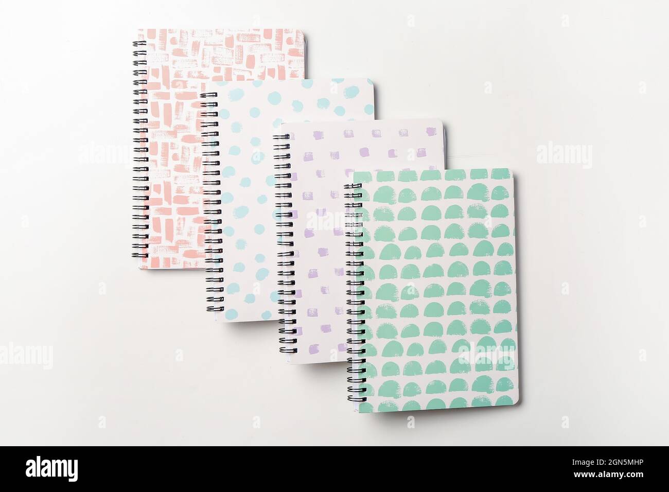 Stylish notebooks on white background Stock Photo - Alamy