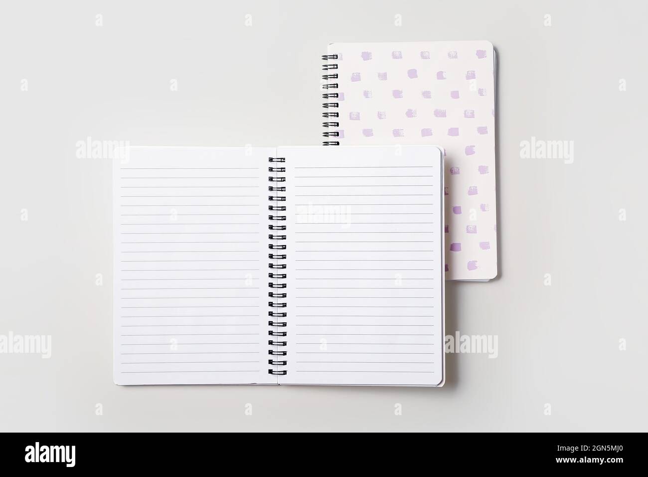 Stylish notebooks on white background Stock Photo - Alamy