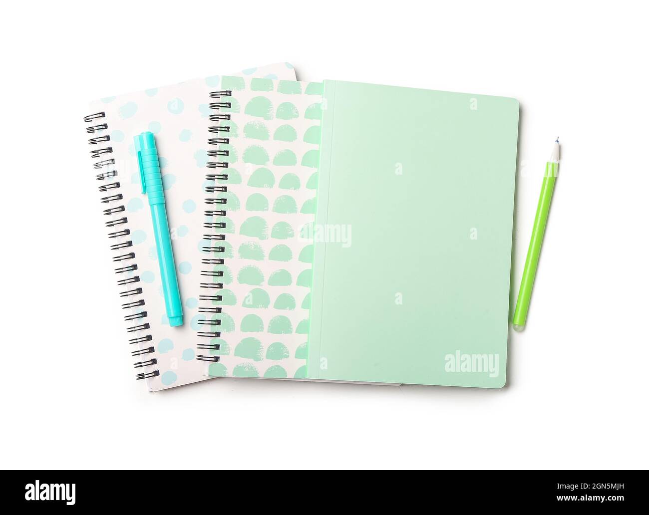 Stylish notebooks and pens on white background Stock Photo - Alamy