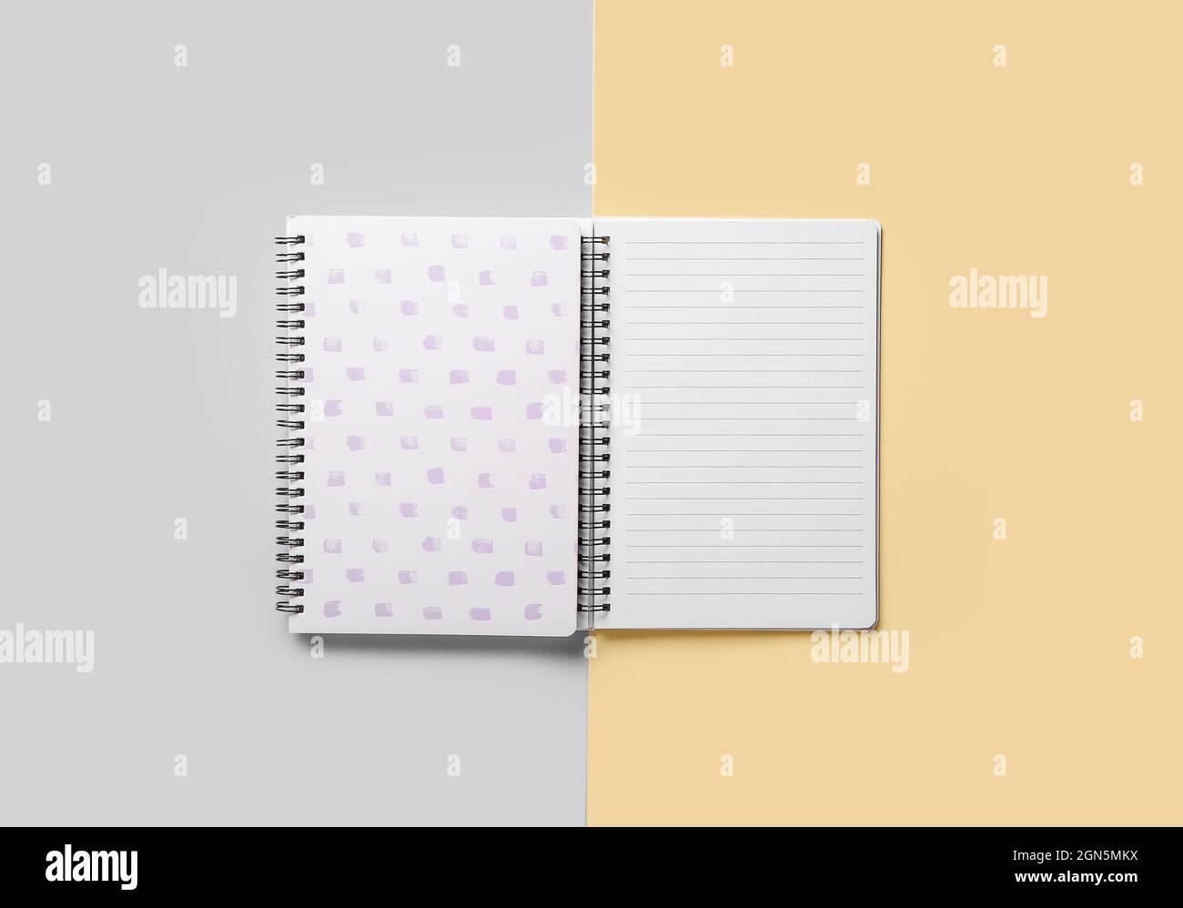 Stylish notebooks on color background Stock Photo - Alamy