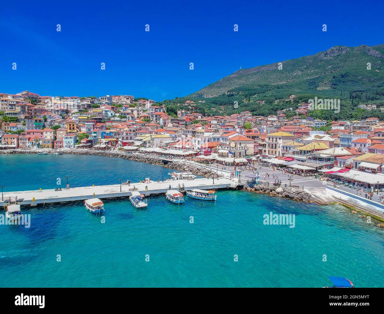 Aerial panoramic cityscape view over Parga coastal city, Epirus, Greece ...