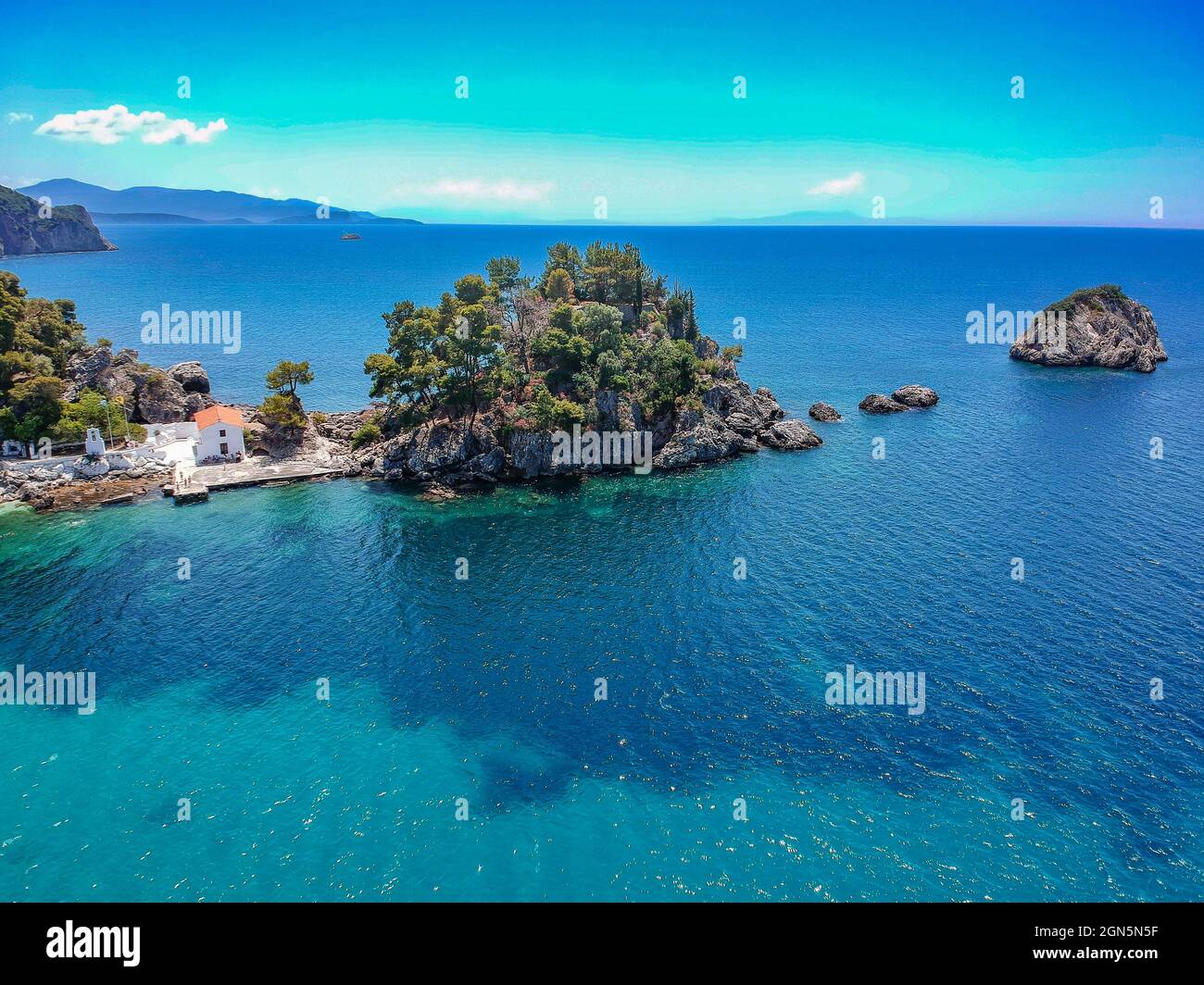 Aerial panoramic cityscape view over Parga coastal city, Epirus, Greece ...