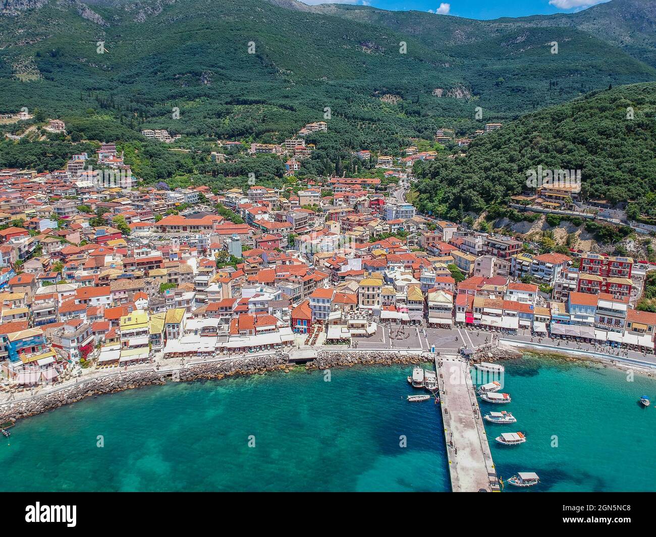 Aerial panoramic cityscape view over Parga coastal city, Epirus, Greece ...