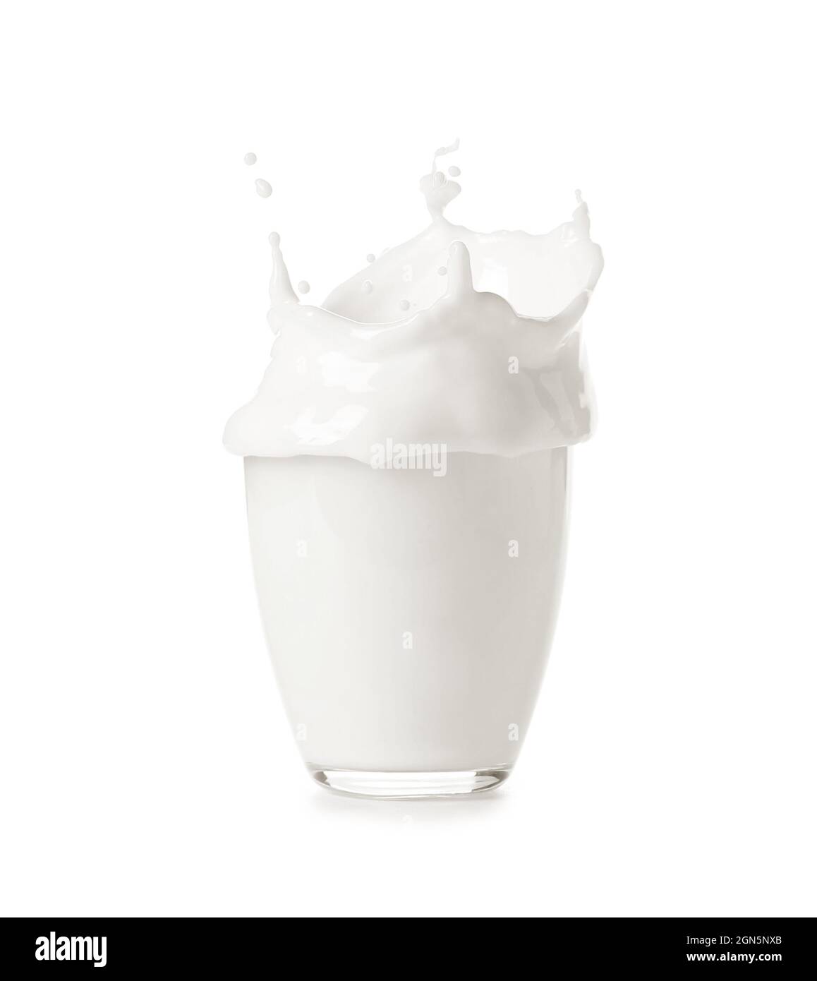 Milk wave of splashes in glass on white background Stock Photo - Alamy