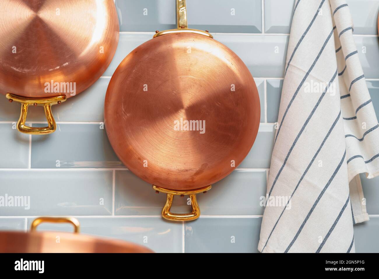 Modern kitchen details with copper kitchenware close up Stock Photo - Alamy