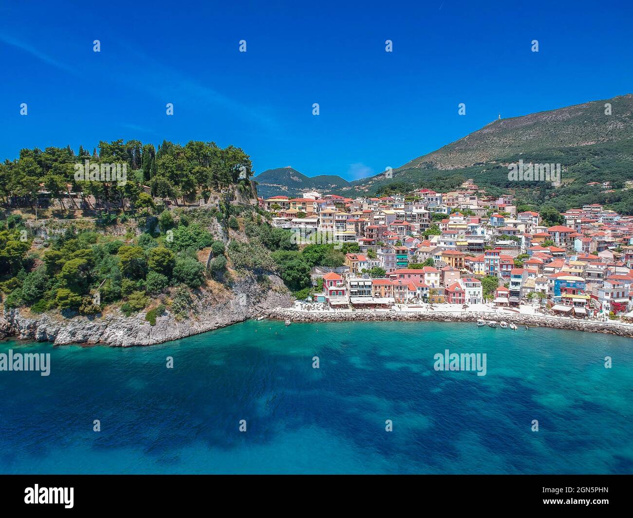 Aerial panoramic cityscape view over Parga coastal city, Epirus, Greece ...