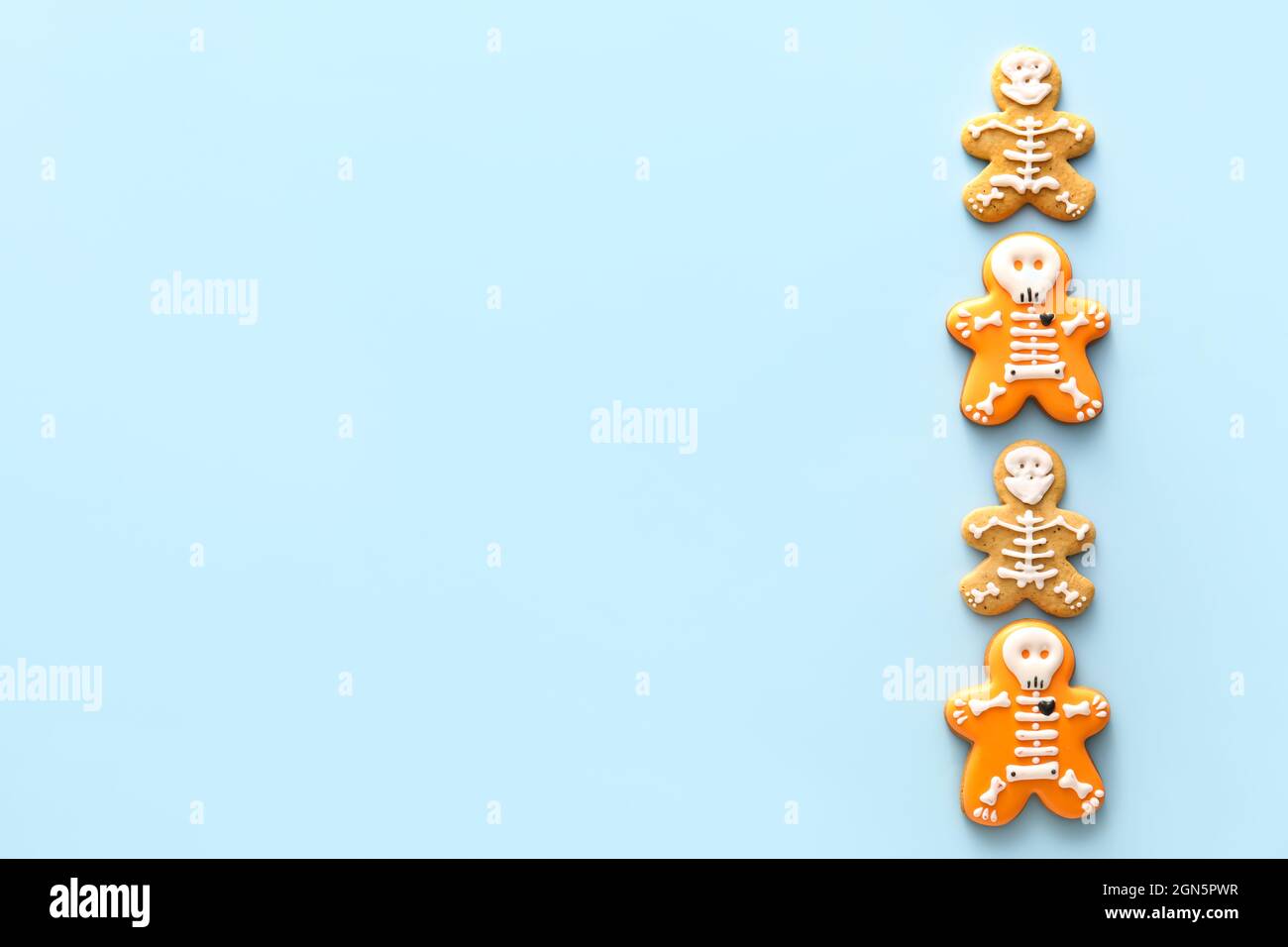 Tasty cookies for Halloween celebration on color background Stock Photo ...