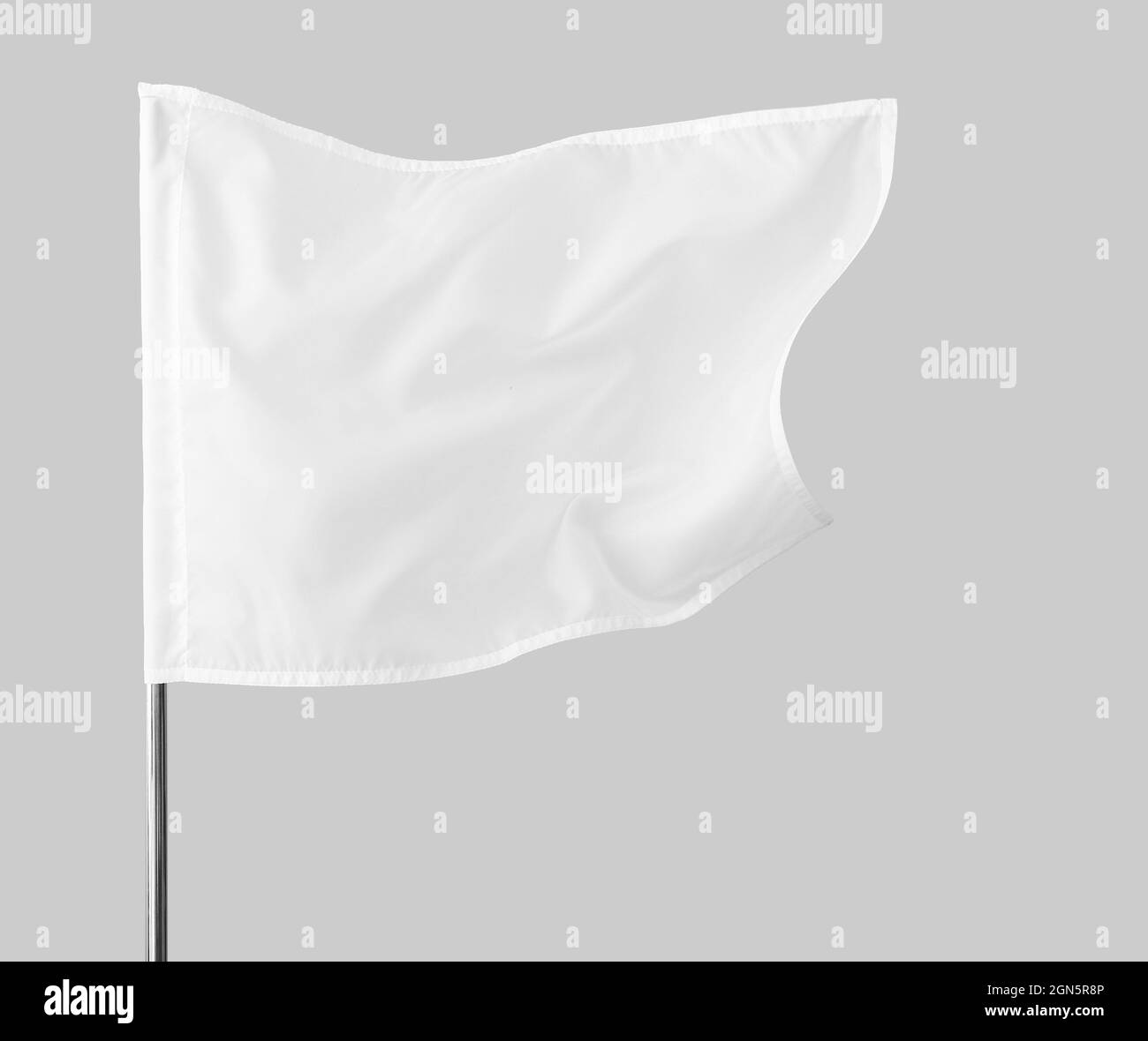 White flag on grey background Stock Photo - Alamy