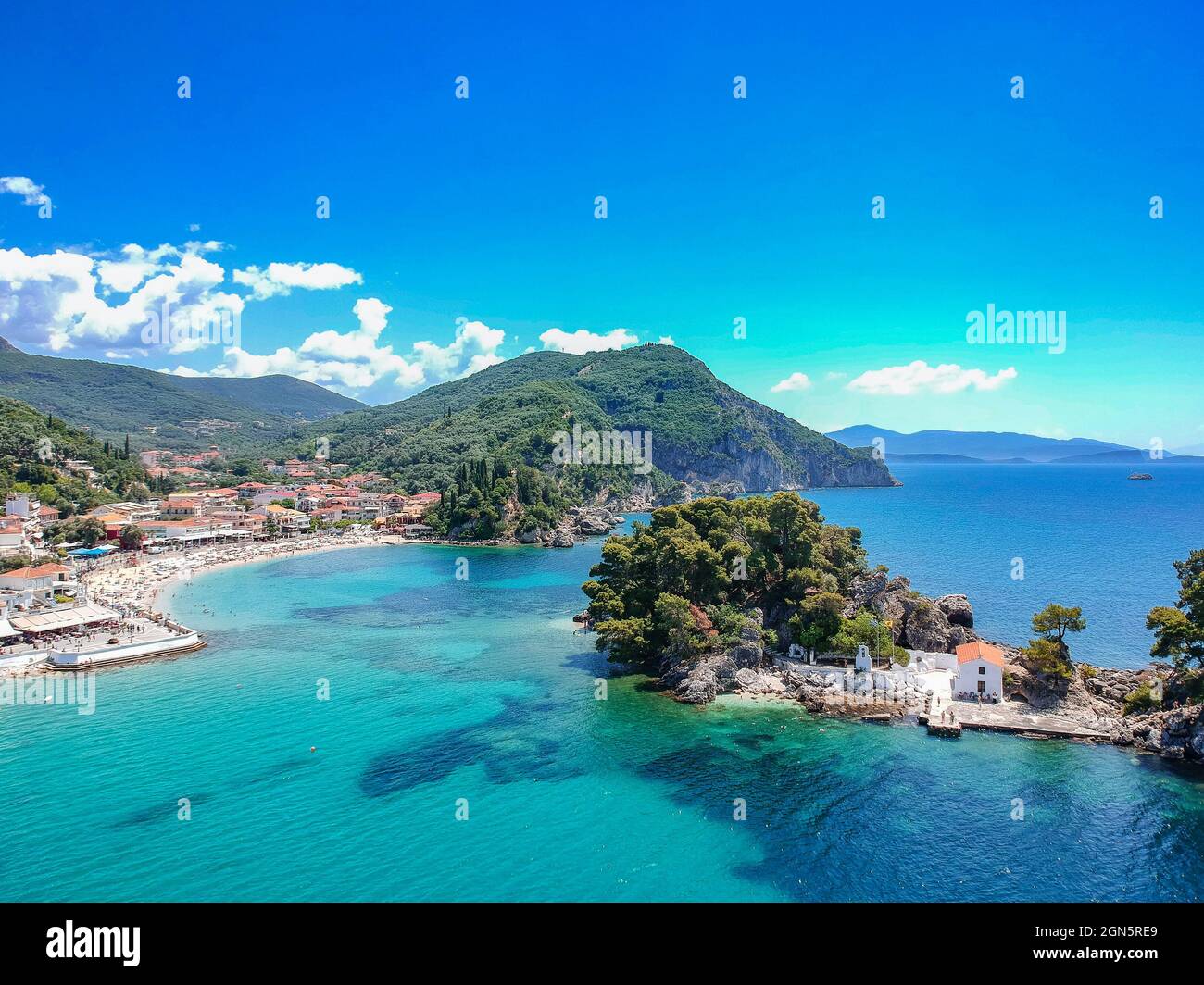 Aerial panoramic cityscape view over Parga coastal city, Epirus, Greece ...
