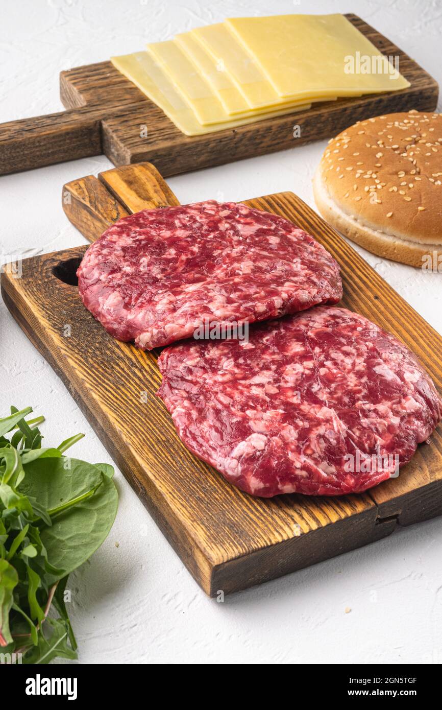 Beef minced meat cutlet set, on white stone background Stock Photo - Alamy