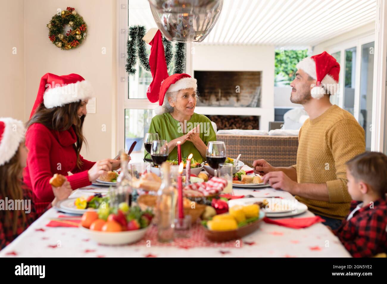Happy family at christmas table hi-res stock photography and images - Alamy