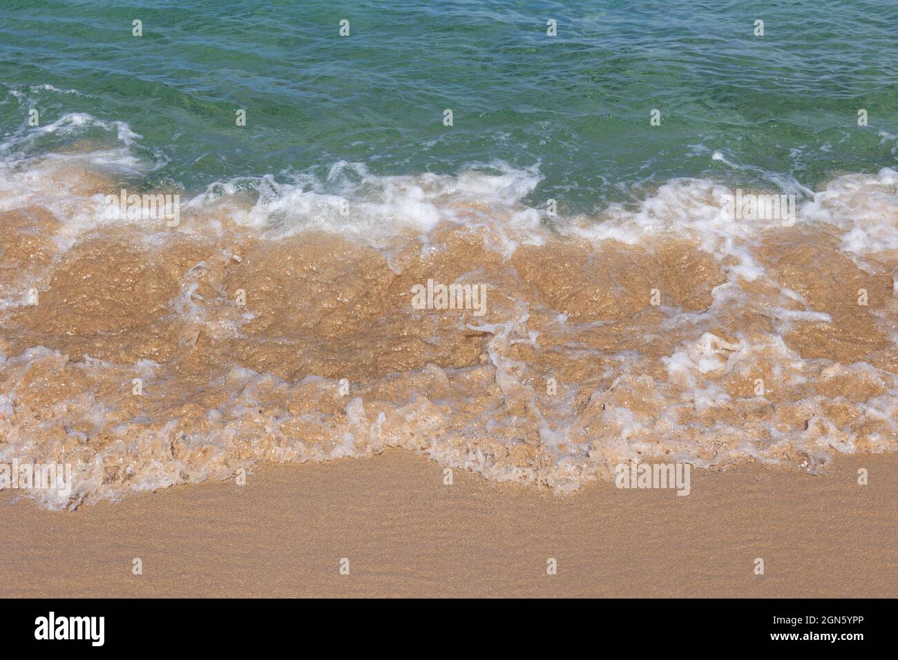 Wave on sand close up in tropical beach. Ocean water background Stock ...