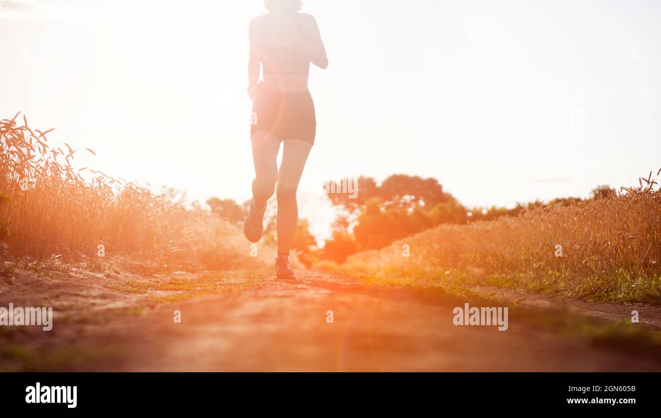 Young girl is running outdoor Stock Photo - Alamy