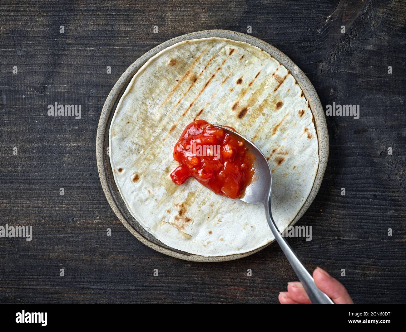 process of making mexican food tacos. plate of gluten free tortilla and ...
