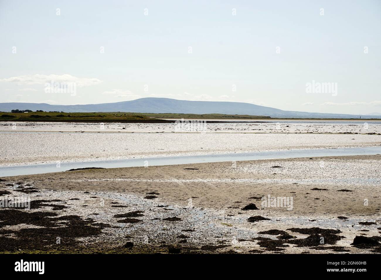Beautiful seascape during low tide in the morning Stock Photo - Alamy