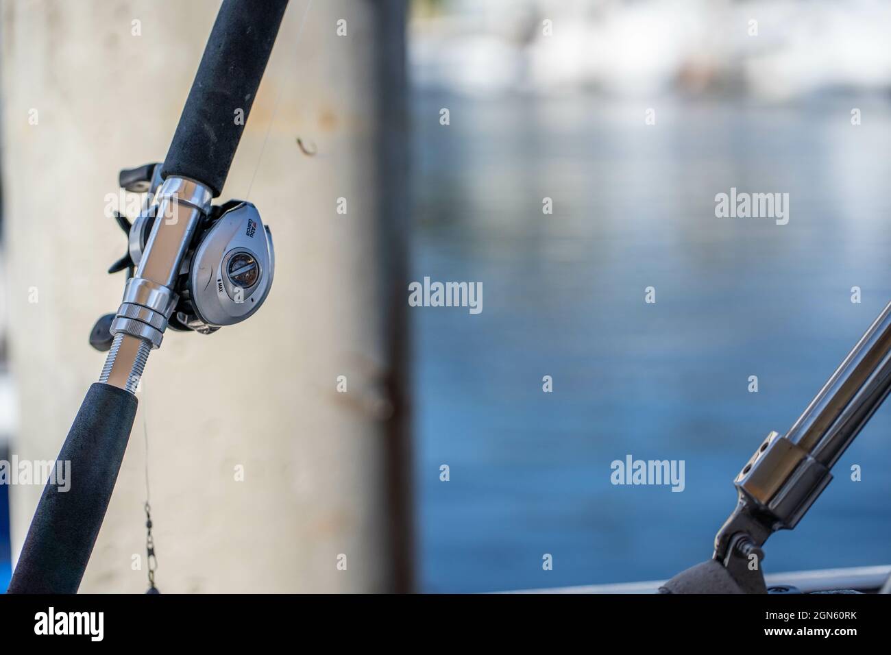 Soft focus of a an old fishing reel on a boat at sea Stock Photo - Alamy