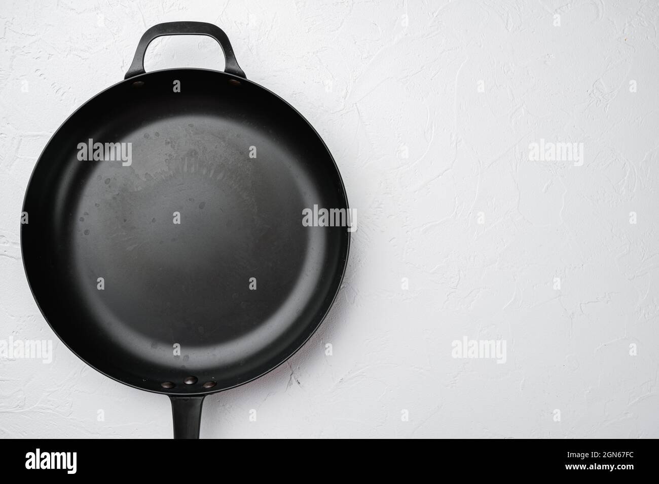 Cast iron frying pan set with copy space for text or food with copy ...